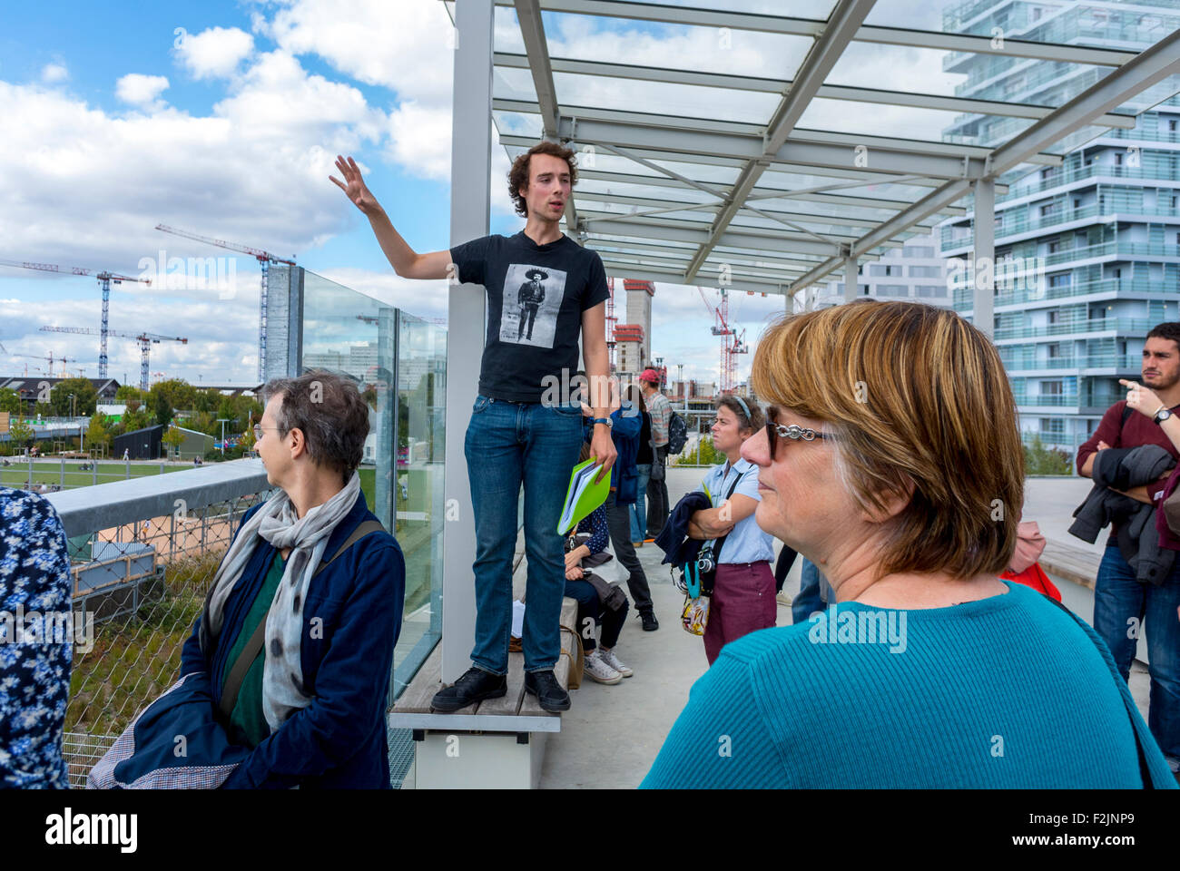 Paris, France, Tour Guide leading groups Speaking to Group of Tourists ...