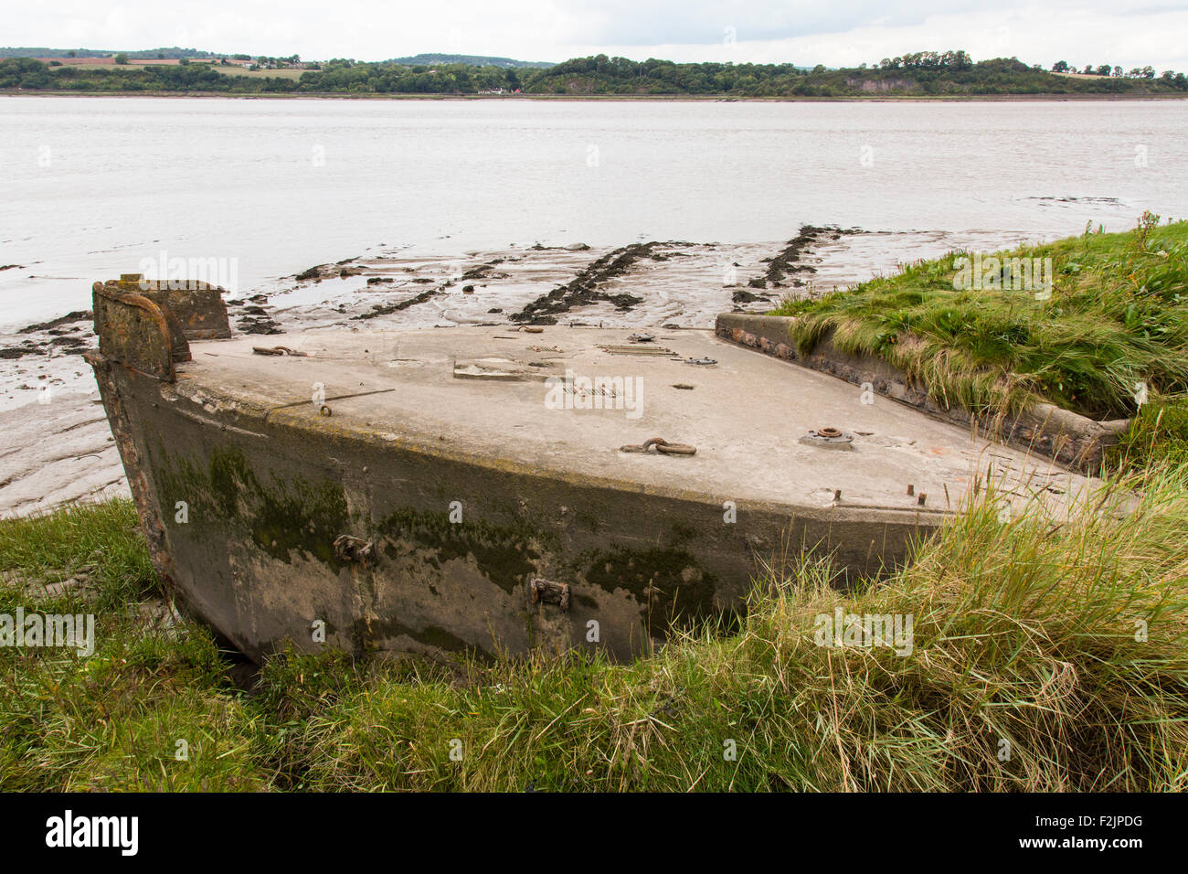 Abandoned boats at Purton ship graveyard on the bank of the river ...