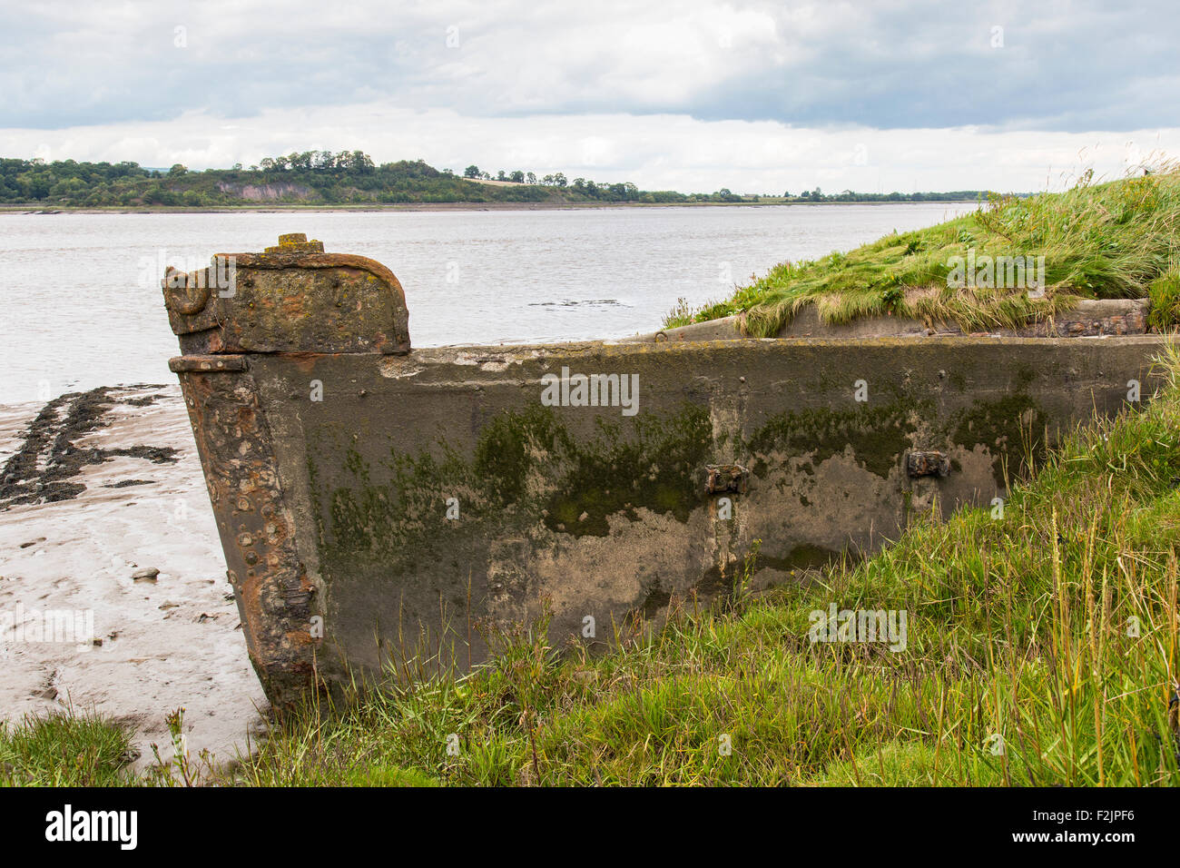 Abandoned boats at Purton ship graveyard on the bank of the river ...