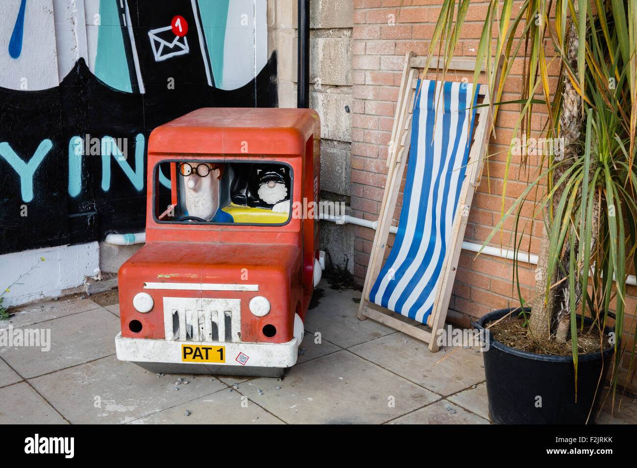 A one eyed Postman Pat with his black and white cat in his van Pat 1 at ...