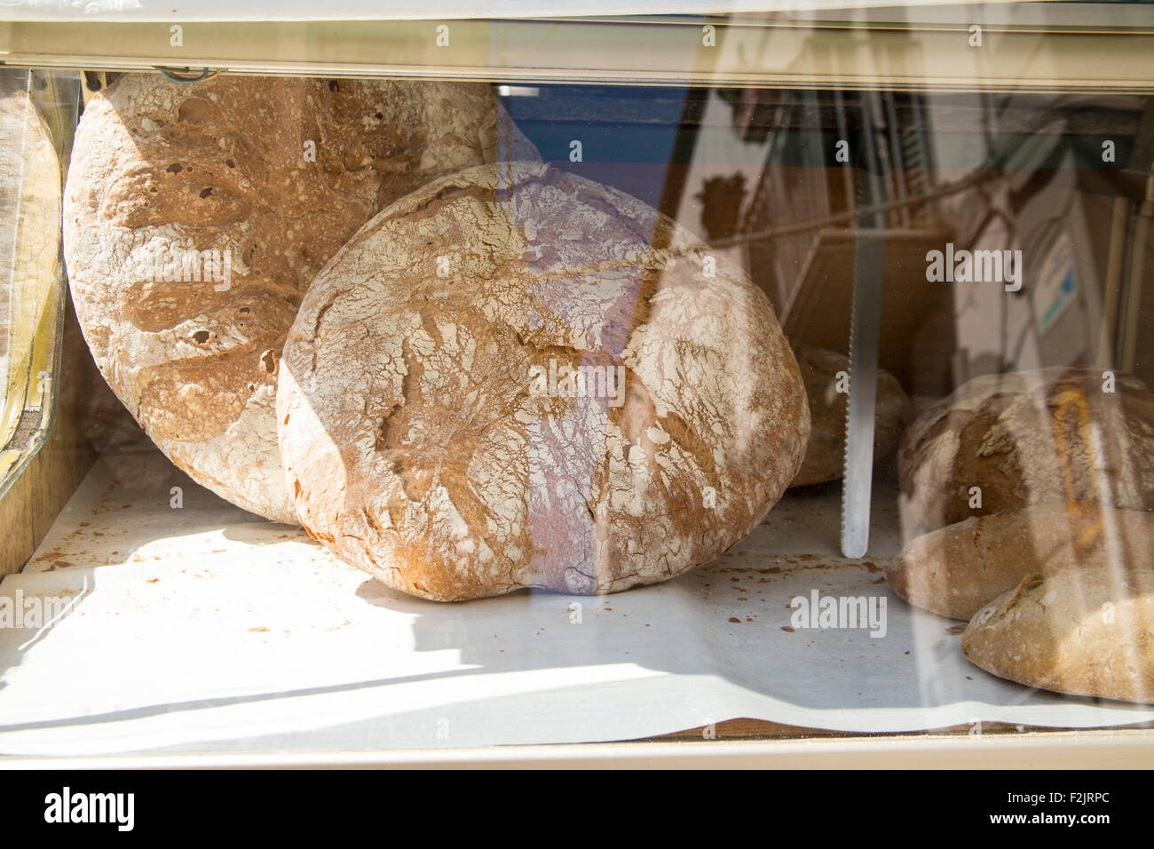 Italy Bakery display case with bread and reflections Stock Photo - Alamy