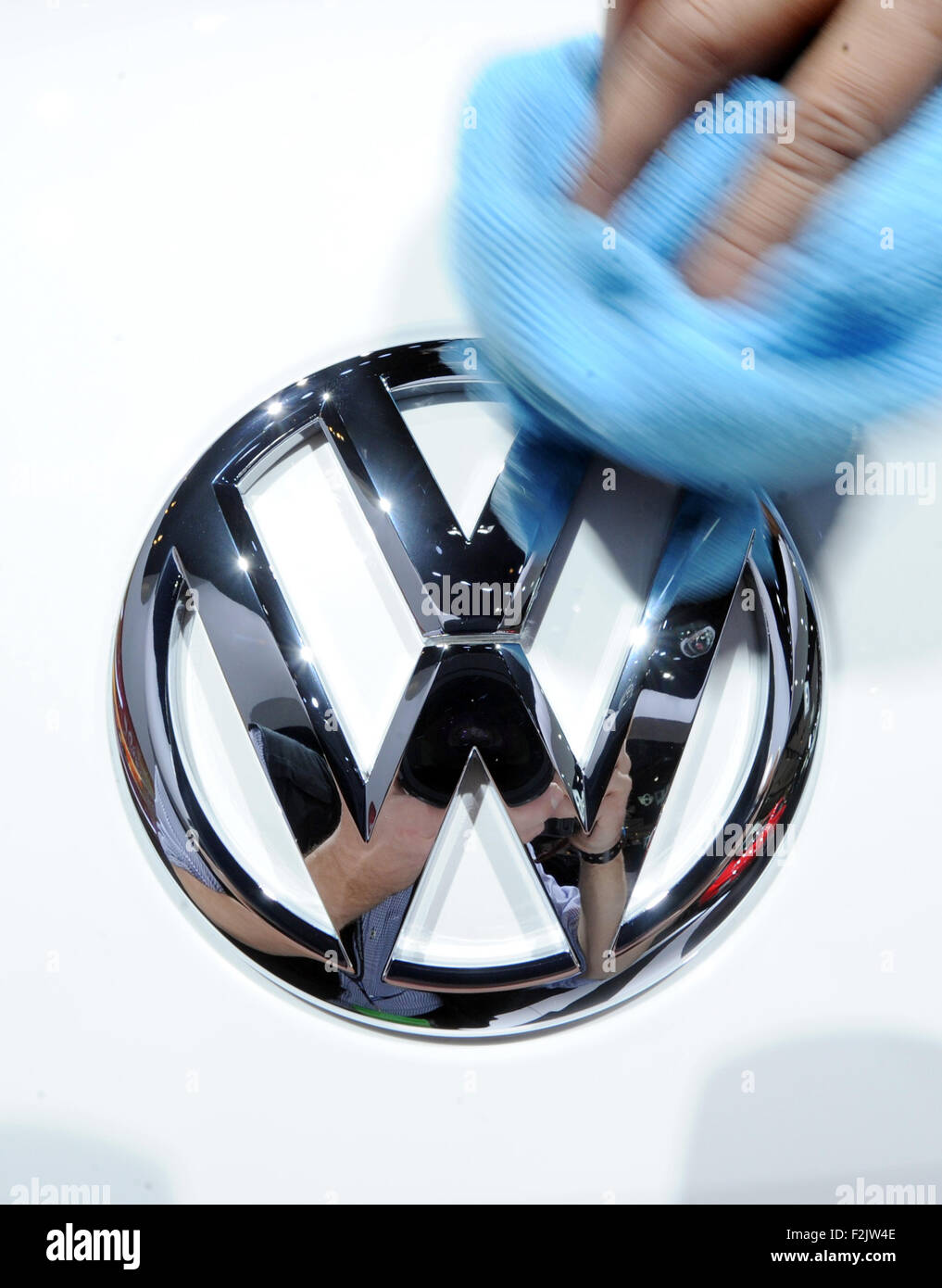 A VW logo is polished on a VW Beetle on the first press day of the ...