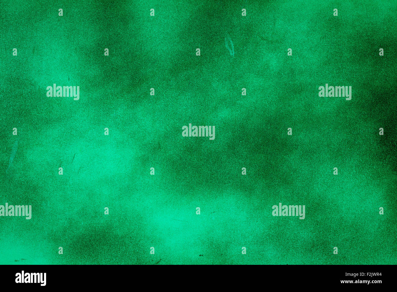 Green texture background with bright center spotlight Stock Photo - Alamy