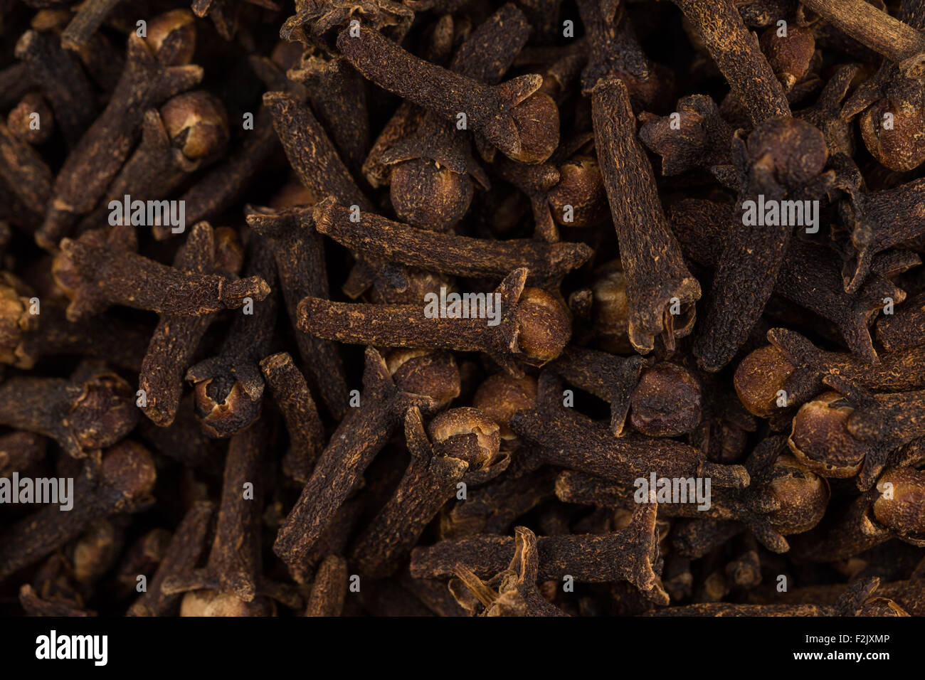 Cloves spice close up as a background Stock Photo - Alamy