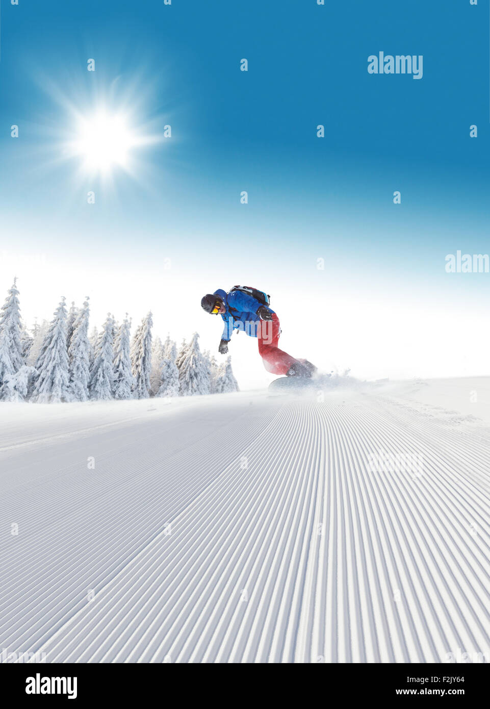 Man snowboarder running downhill Stock Photo - Alamy