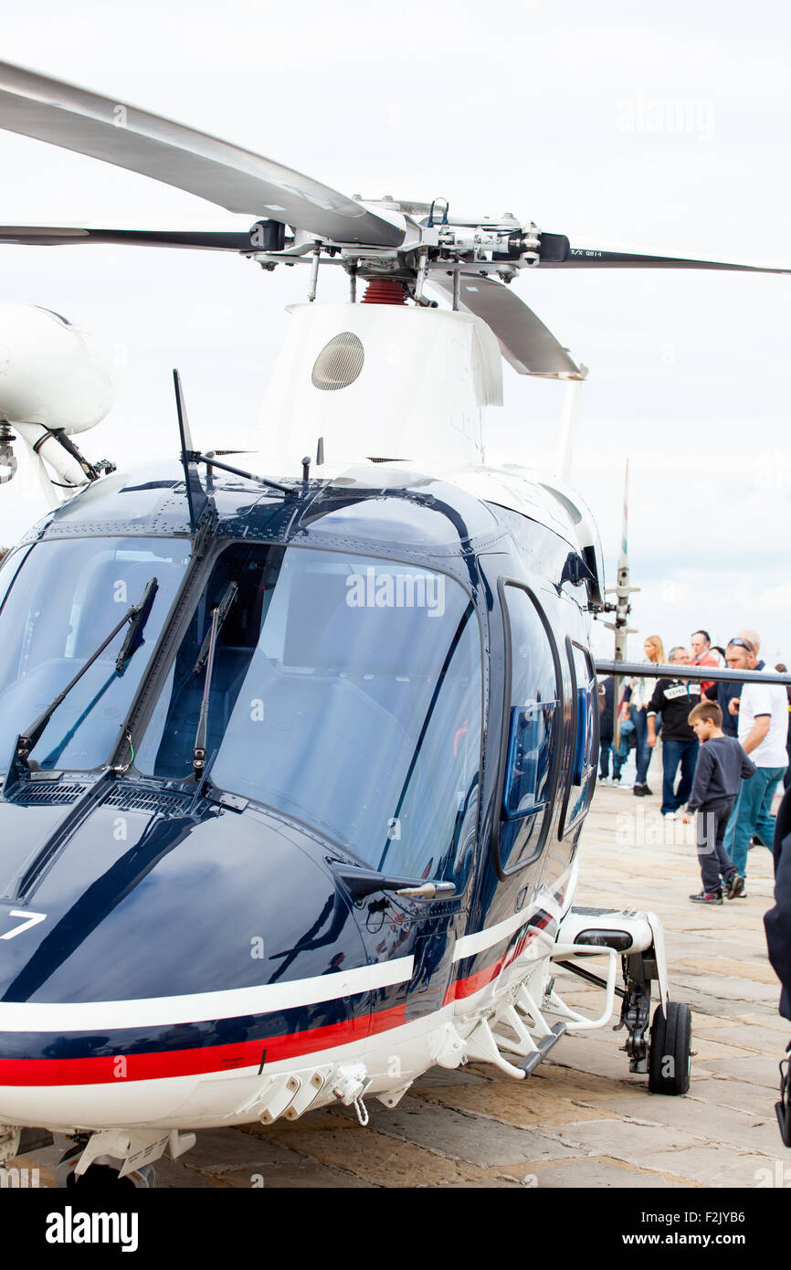 Side view of a helicopter on the ground Stock Photo - Alamy