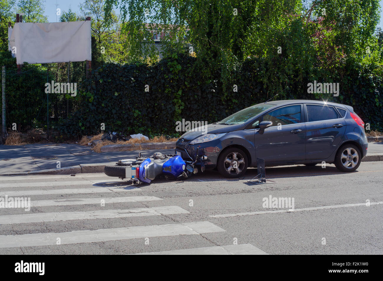 Scooter crash in the urban street, Milan Stock Photo - Alamy