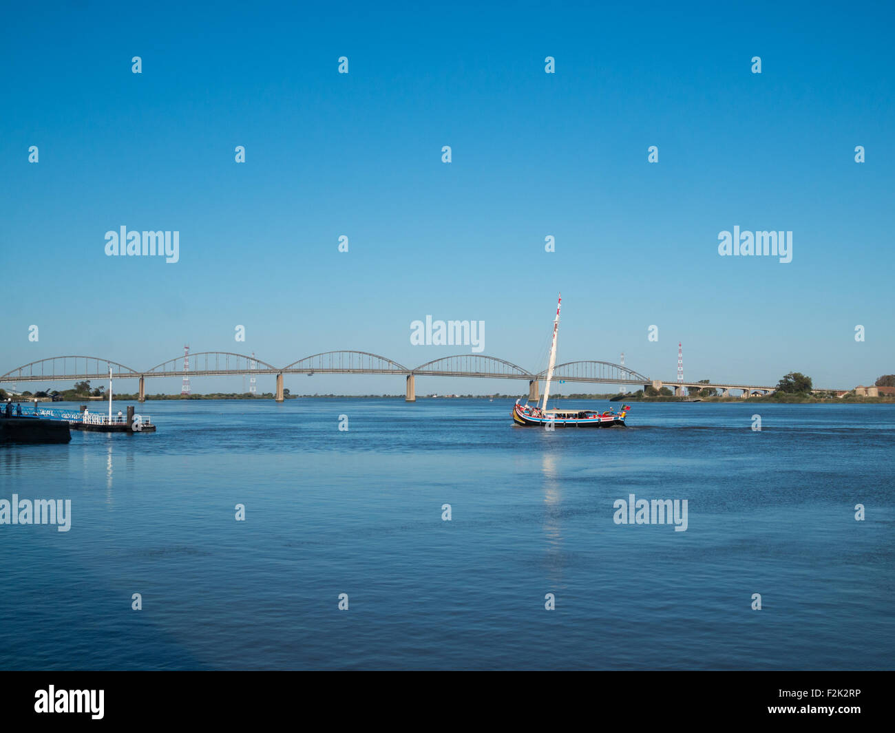 Falua boat in Tagus river by Vila Franca de Xira bridge Stock Photo - Alamy