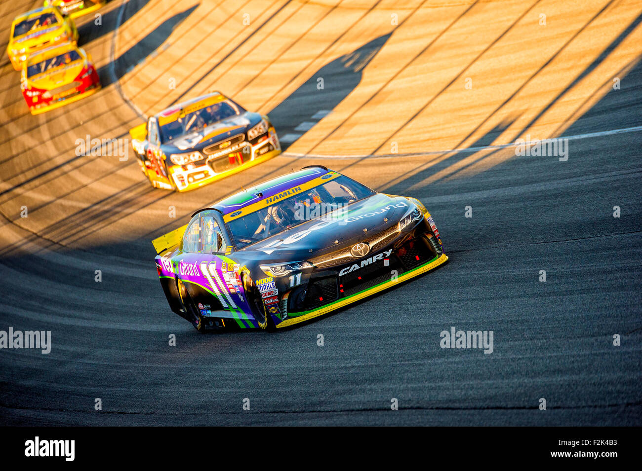 Joliet, IL, USA. 20th Sep, 2015. Denny Hamlin (11) leads the field in ...