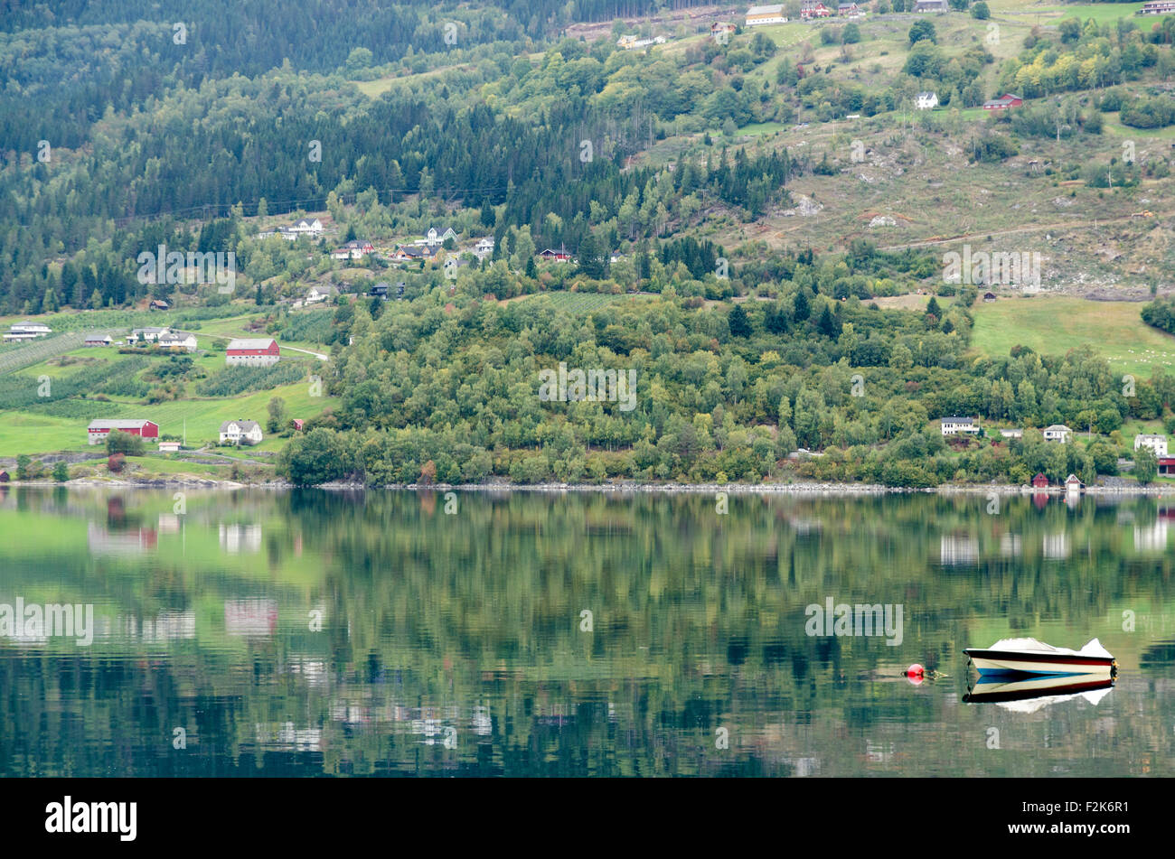 Reflection in Norway fjord at fall time Stock Photo - Alamy