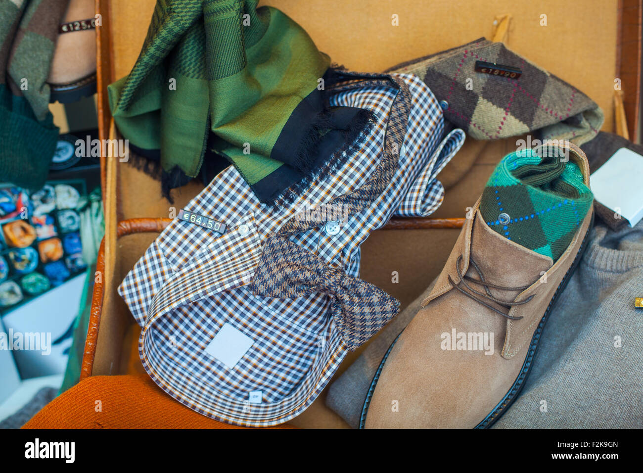 Male clothes. Shirt, scarf, shoes and bow tie in the clothes shop Stock ...