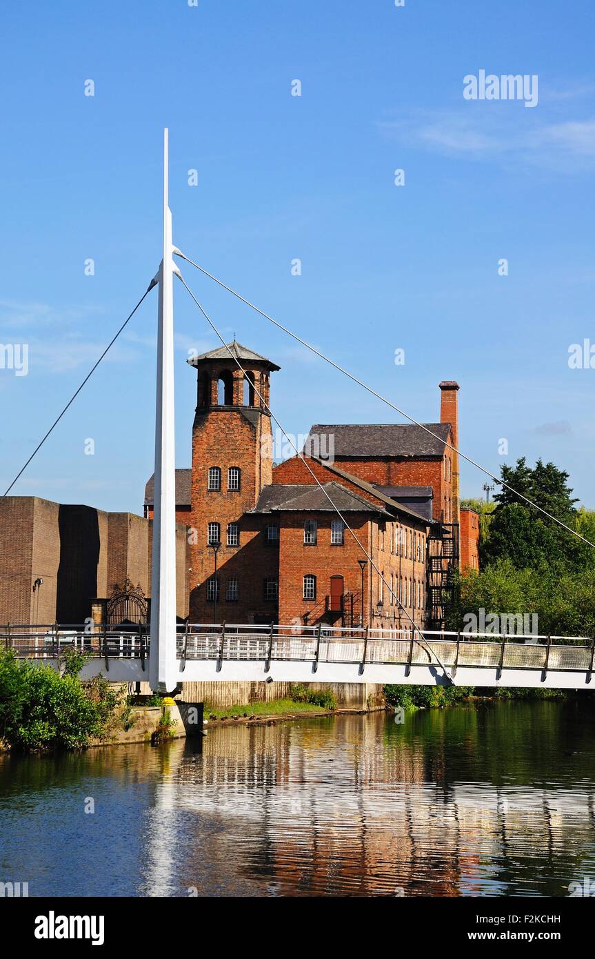 View along the River Derwent showing the Cathedral Green footbridge ...
