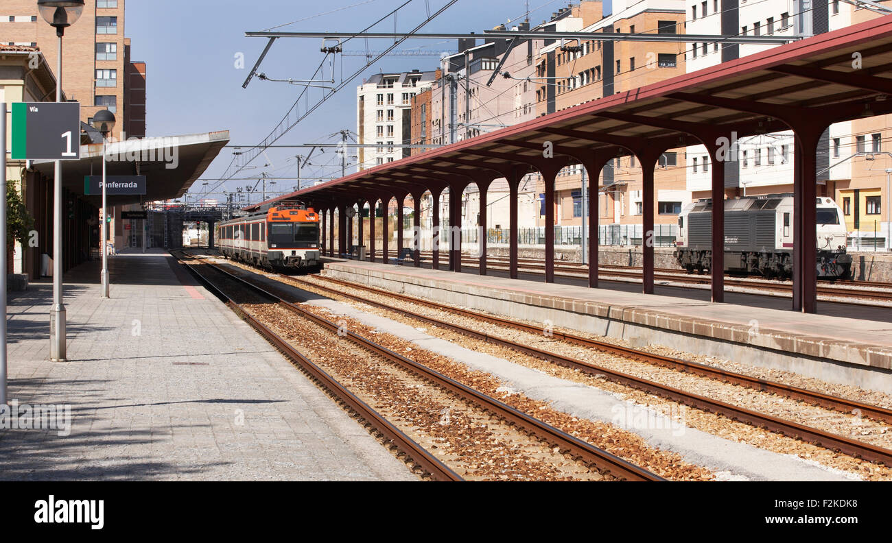 Railway station with platforms and trains in a city Stock Photo - Alamy