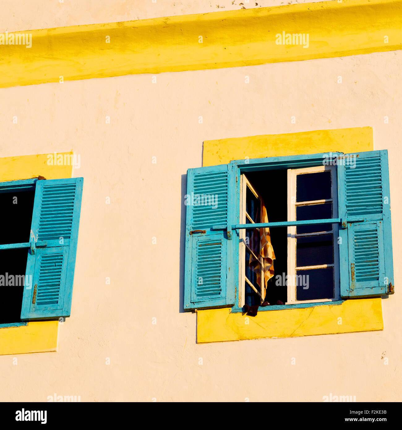 blue window in morocco africa old construction and brown wall ...
