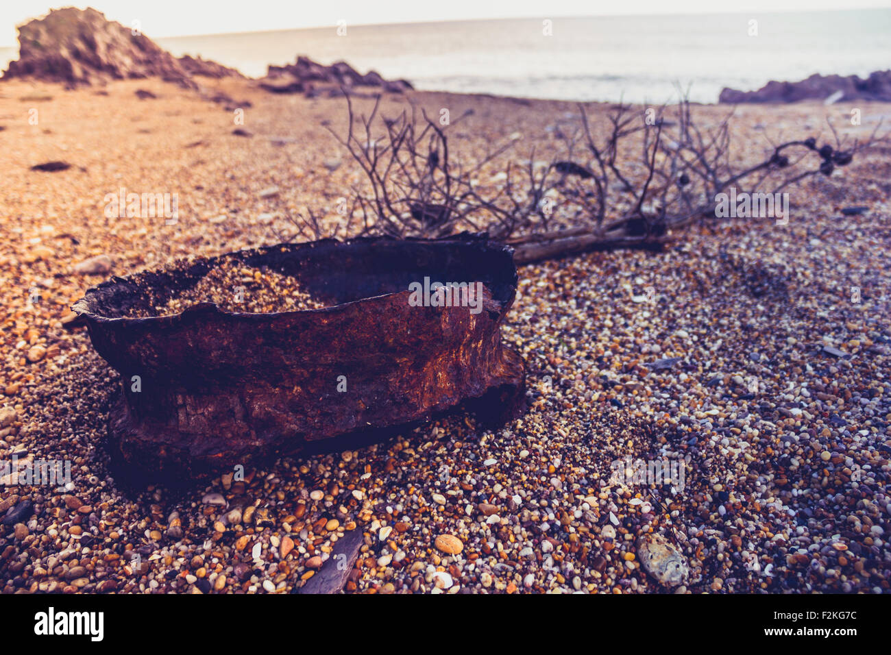 Rusted wheel on the beach Stock Photo - Alamy
