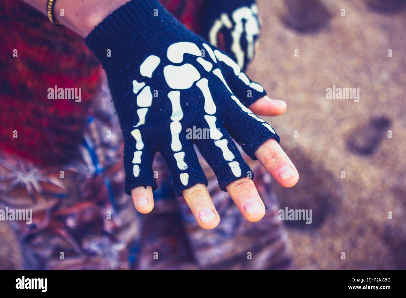 Cold hand on the beach Stock Photo - Alamy