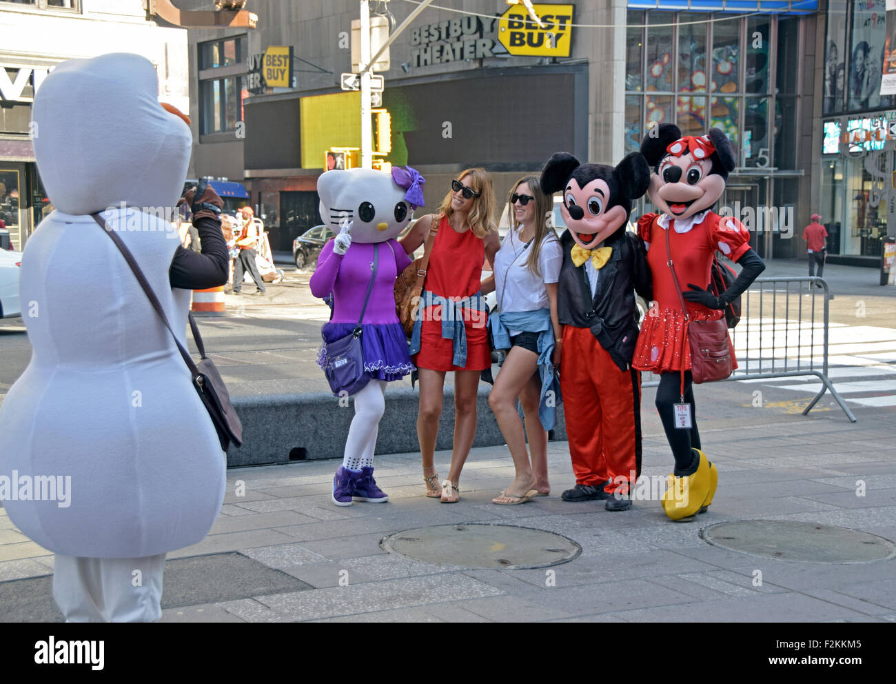 Cartoon & comic characters solicit tourists in Times Square in New York ...