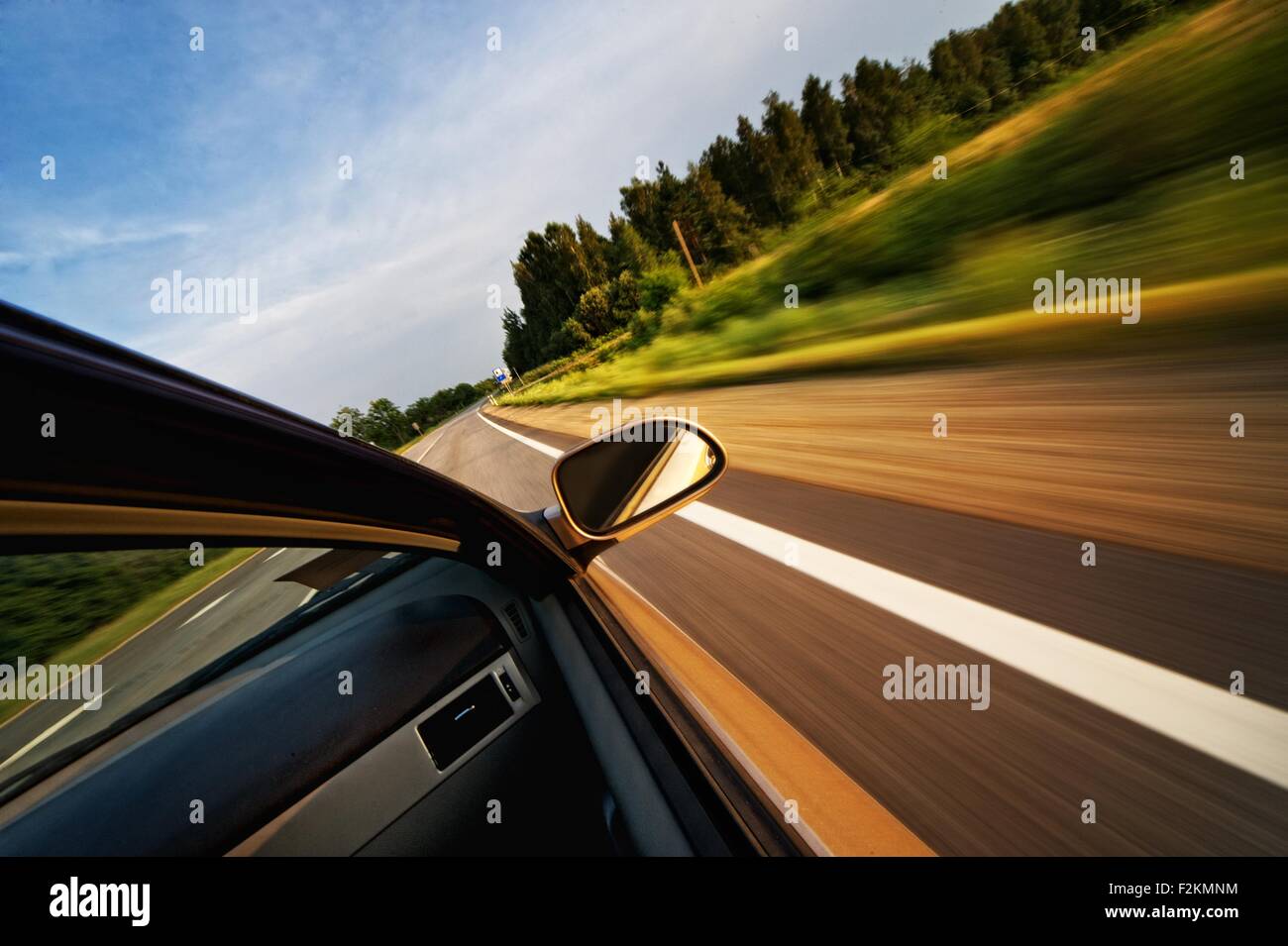 Fast moving car Stock Photo - Alamy