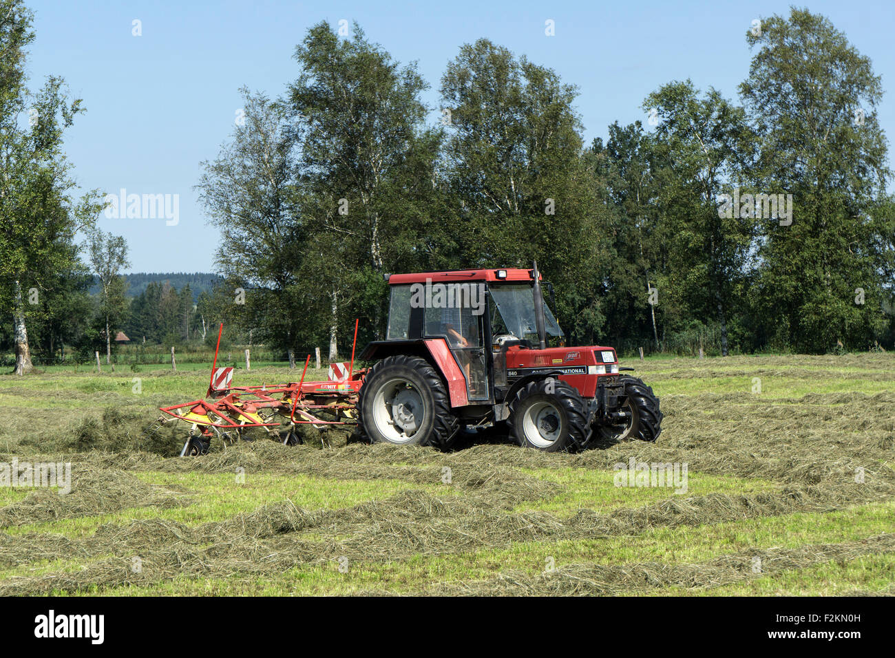 Turning hay hi-res stock photography and images - Alamy