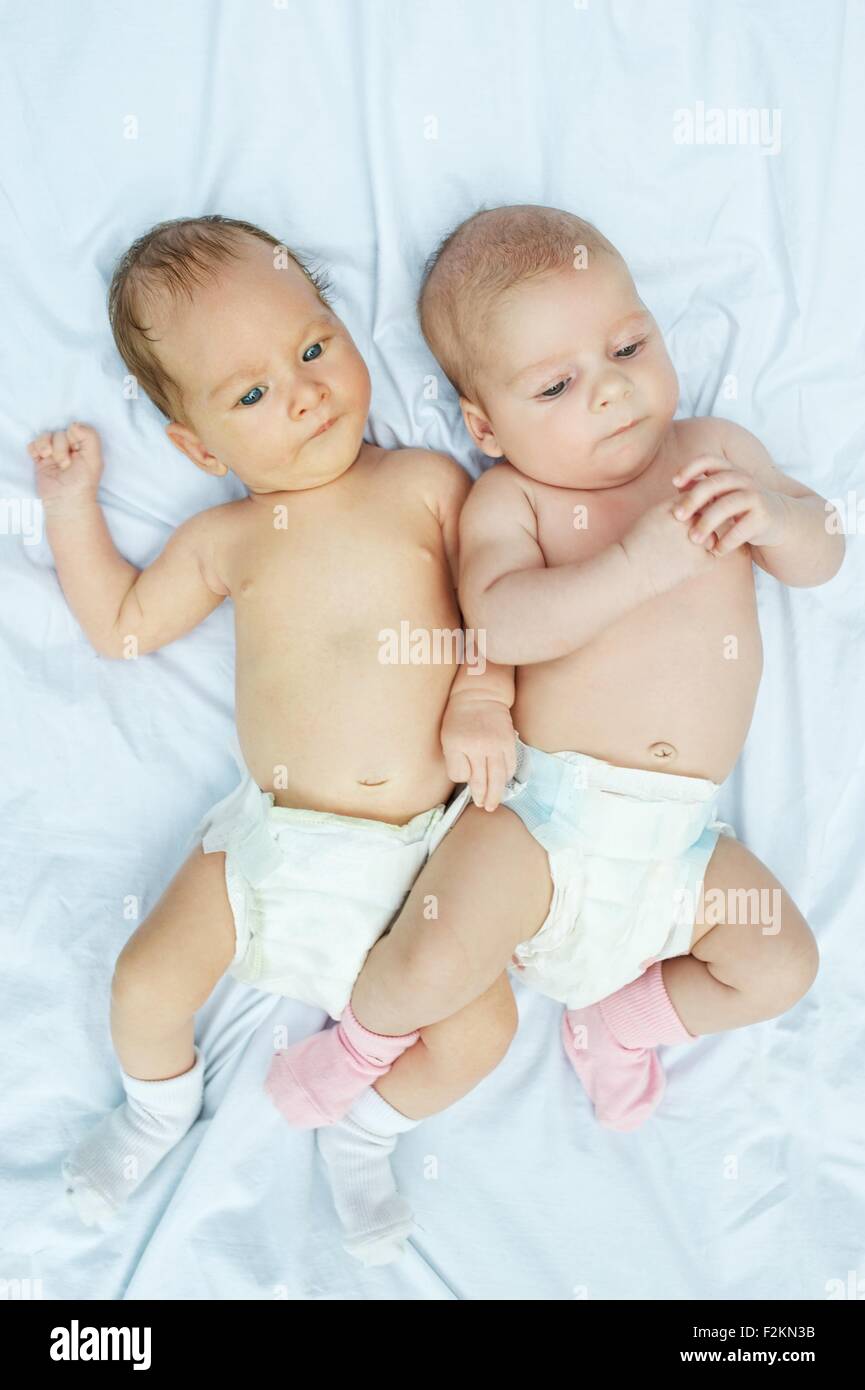 Portrait of a two little baby Stock Photo - Alamy