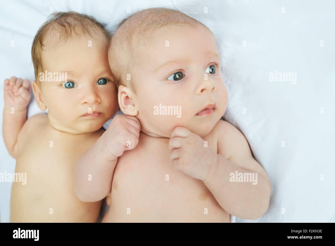 Portrait of a two little baby Stock Photo - Alamy