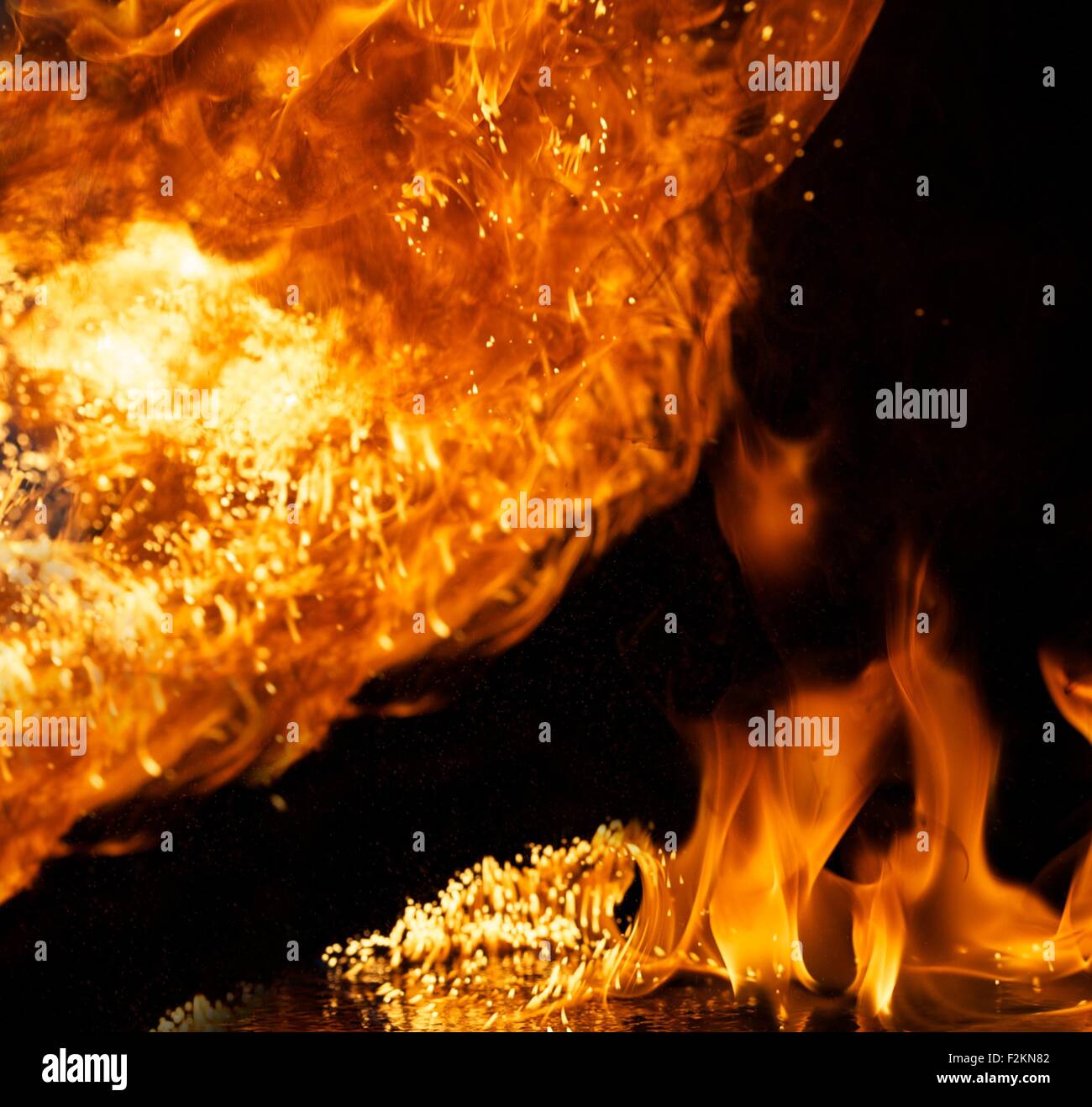 Fire explosion isolated on black background Stock Photo - Alamy