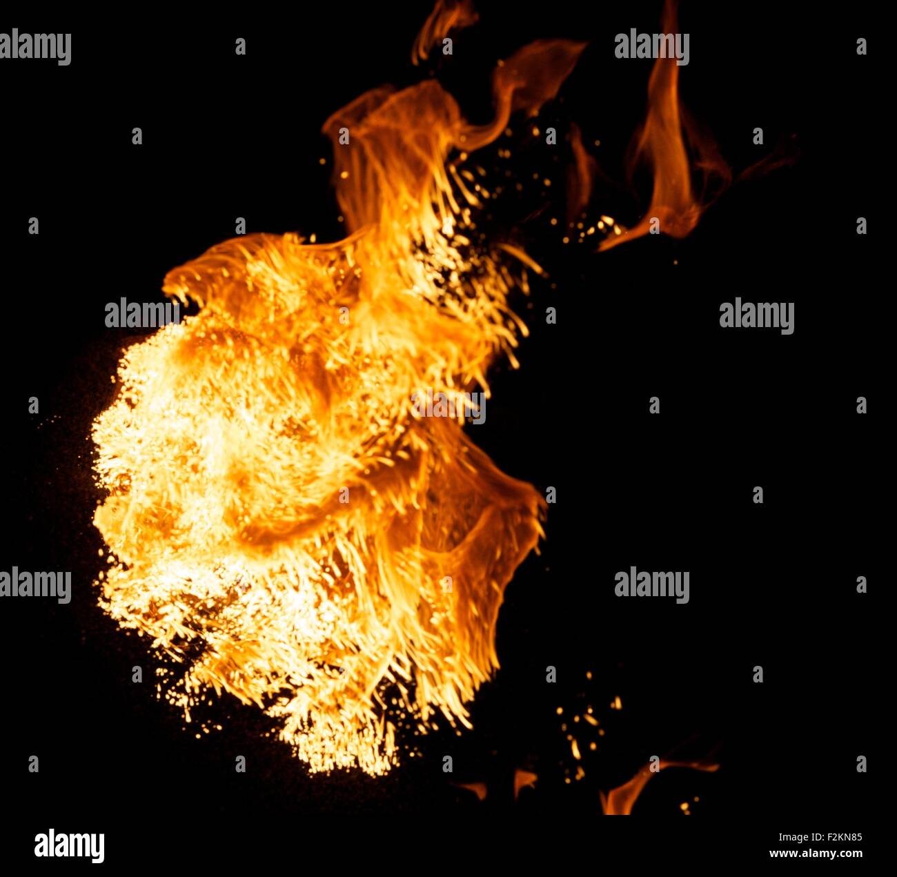Fire explosion isolated on black background Stock Photo - Alamy