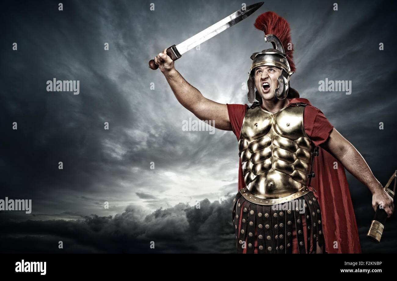 Legionary soldier over stormy sky Stock Photo - Alamy