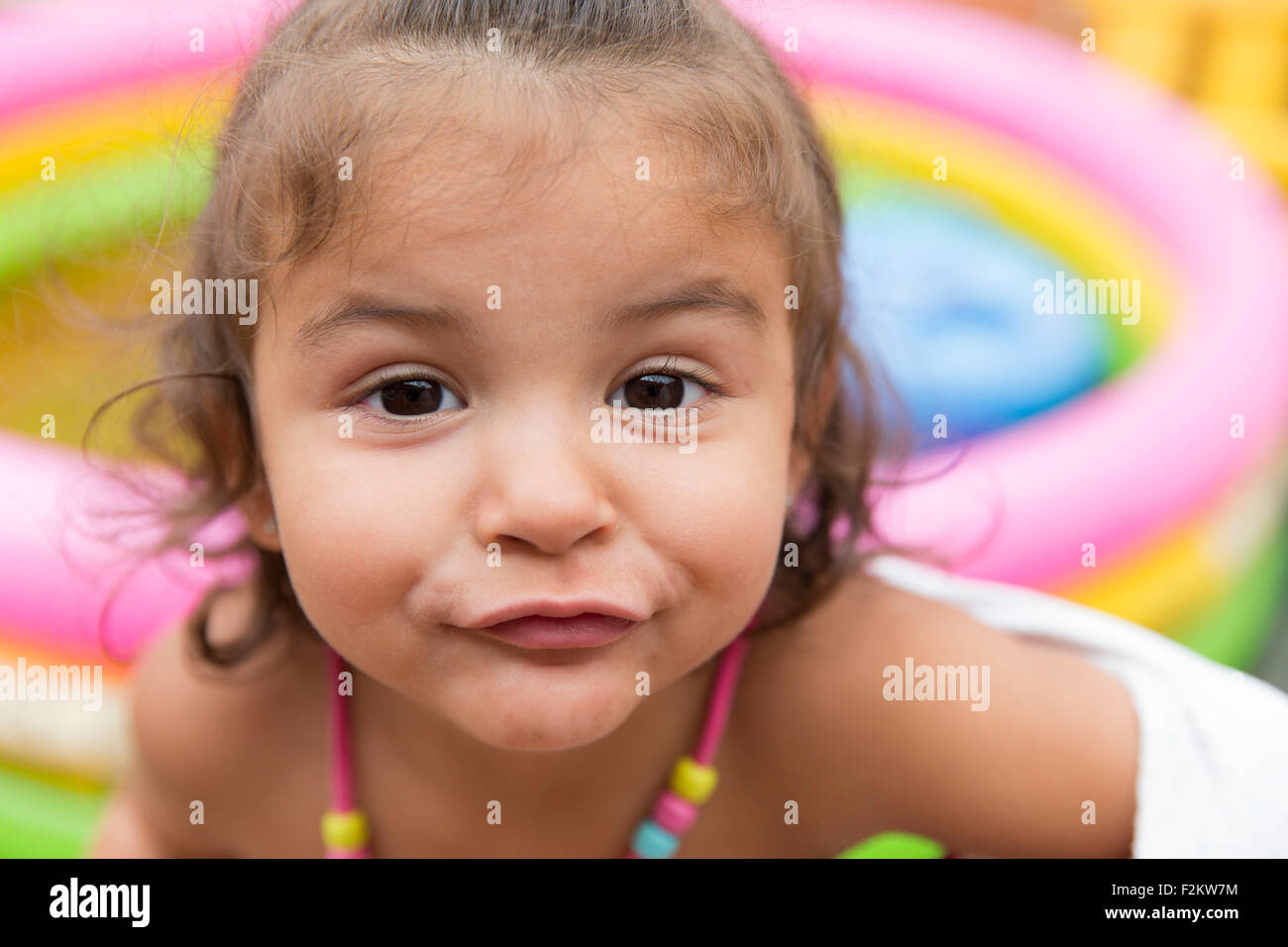 Portrait of little girl pouting mouth Stock Photo - Alamy