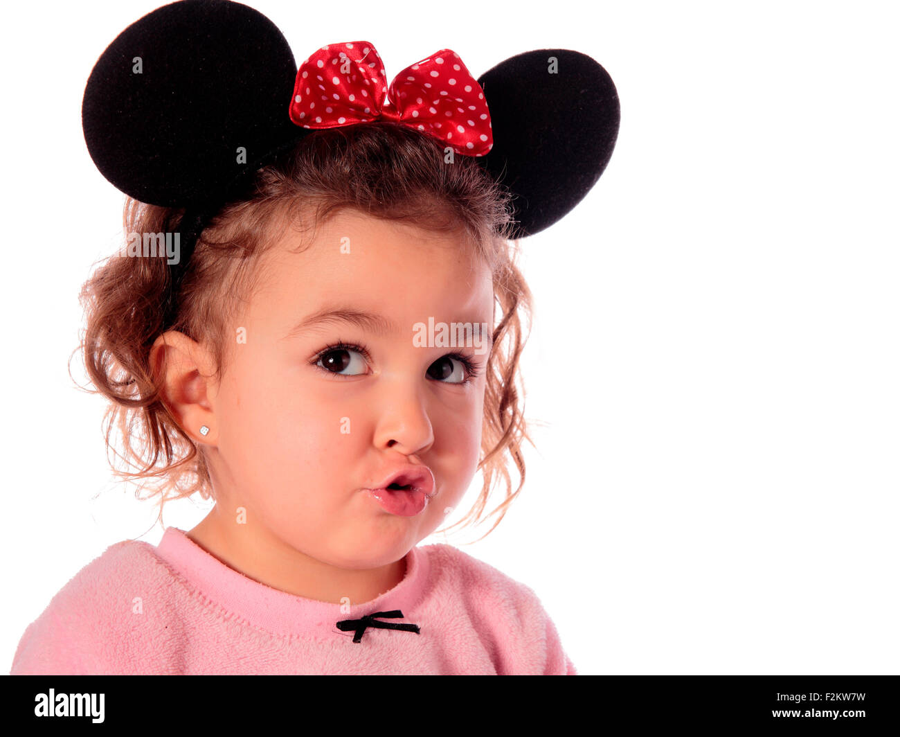 Portrait of litte girl dressed up as Mickey Mouse pouting mouth Stock ...