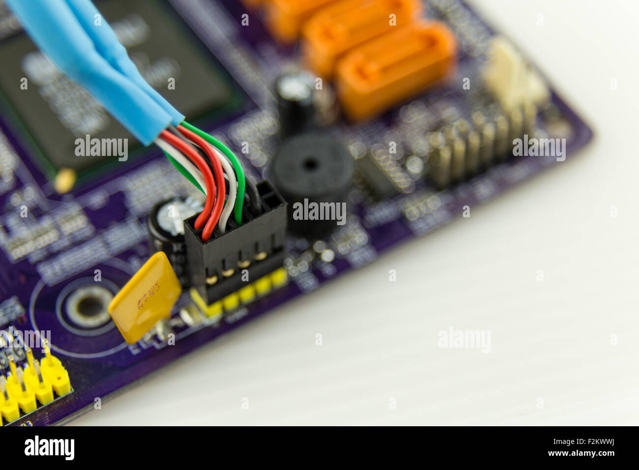 Cables connected to a computer motherboard, macro close-up Stock Photo ...