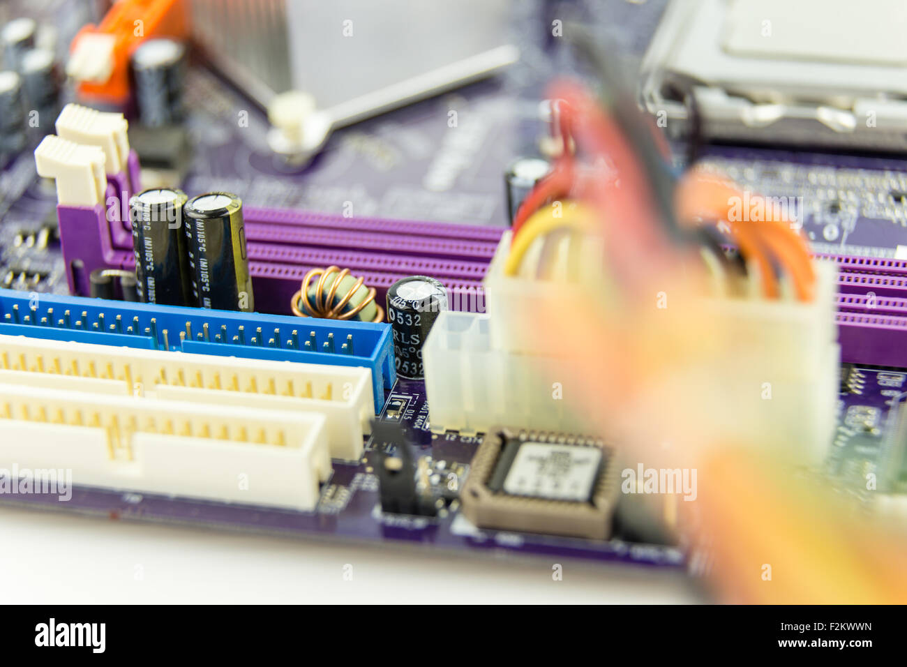 Cables connected to a computer motherboard, macro close-up Stock Photo ...