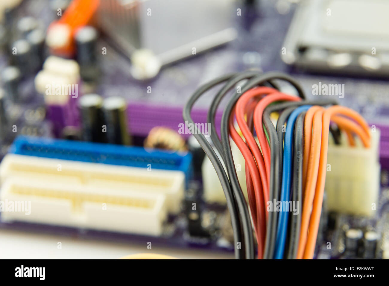 Cables connected to a computer motherboard, macro close-up Stock Photo ...