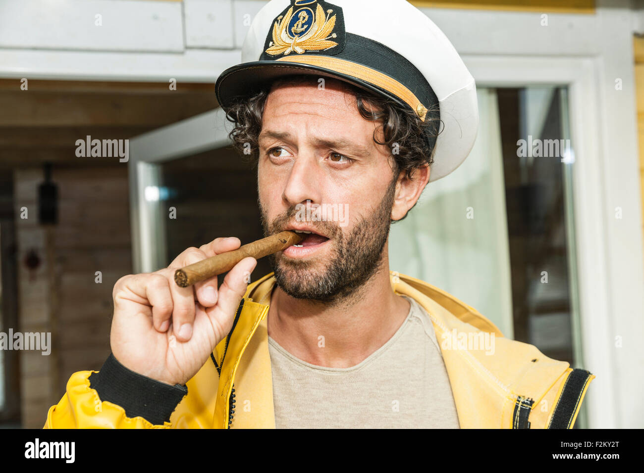Portrait of captain with cigar Stock Photo - Alamy