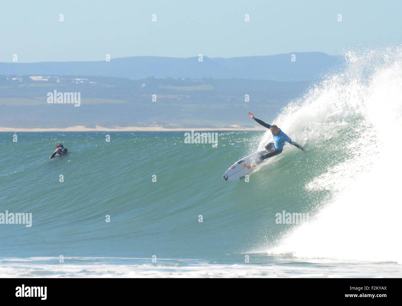Shark In Wave Behind Surfer