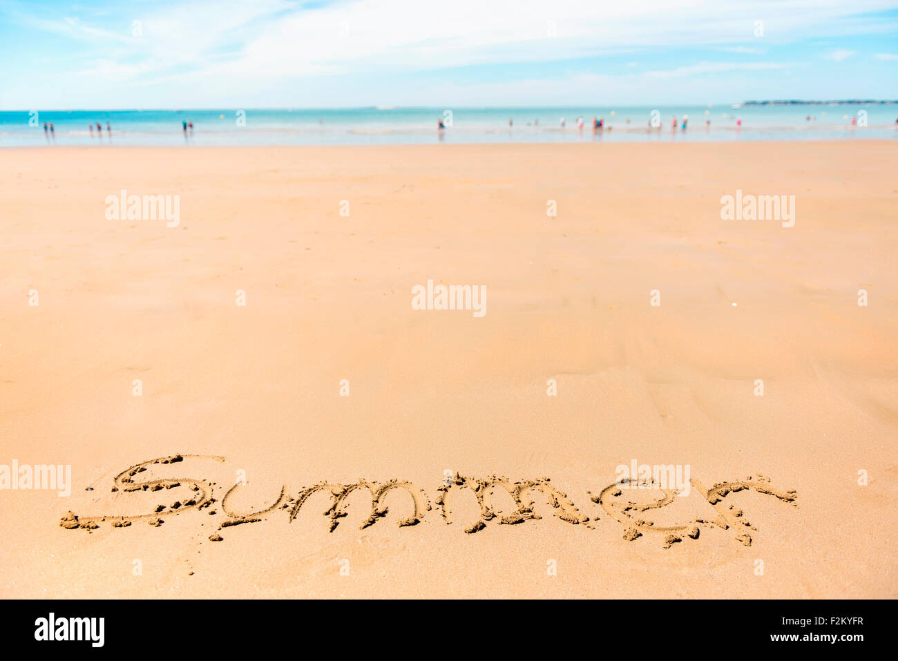 The word 'summer' written in the sand of a beach Stock Photo - Alamy