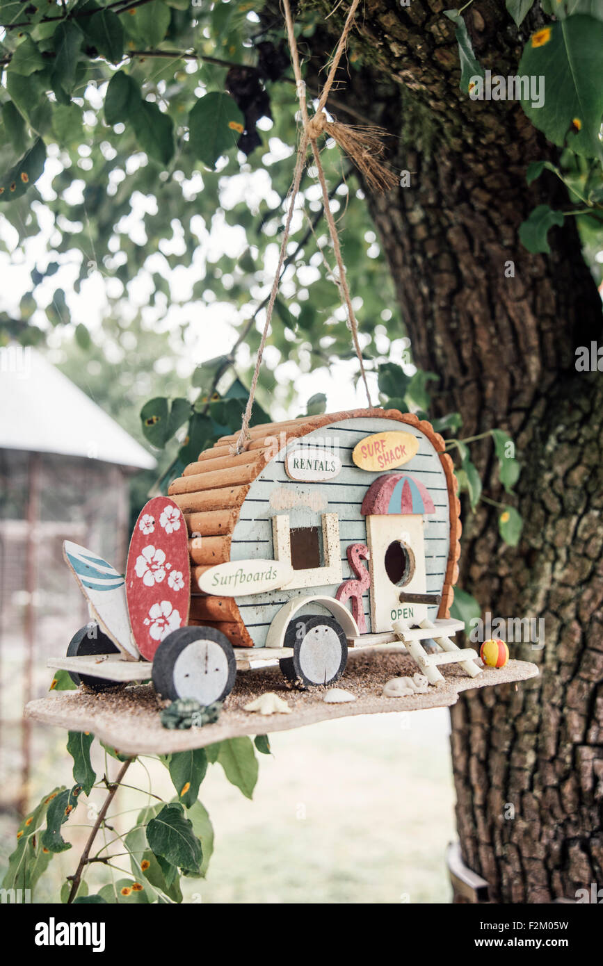 Caravan Bird Houses hanging in a tree Stock Photo - Alamy