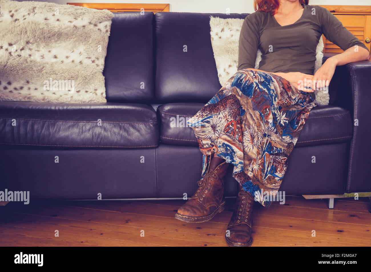 Woman back view sofa hi-res stock photography and images - Alamy
