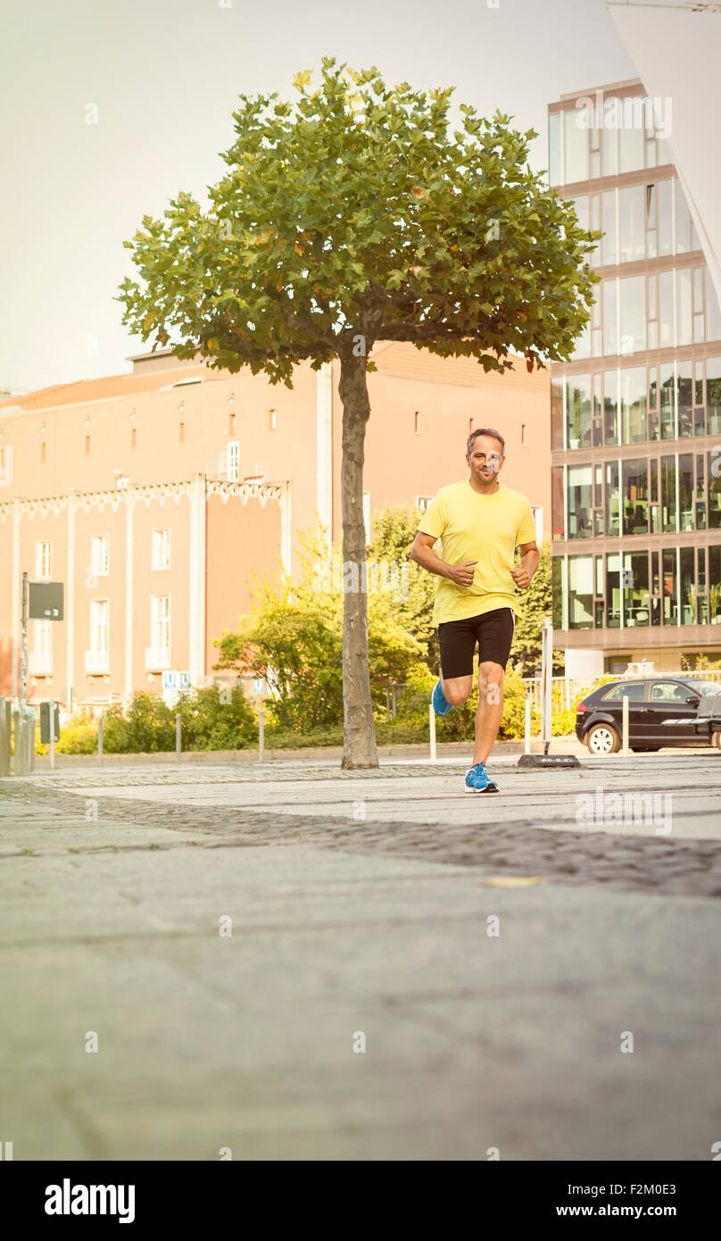 Germany, Stuttgart, man jogging in the city Stock Photo - Alamy