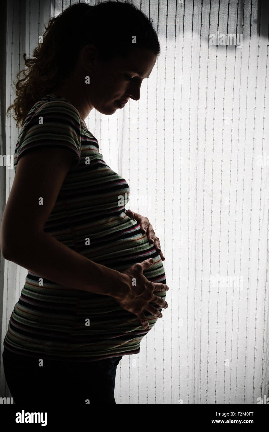 Side View Pregnant Woman Shadow High Resolution Stock Photography and ...