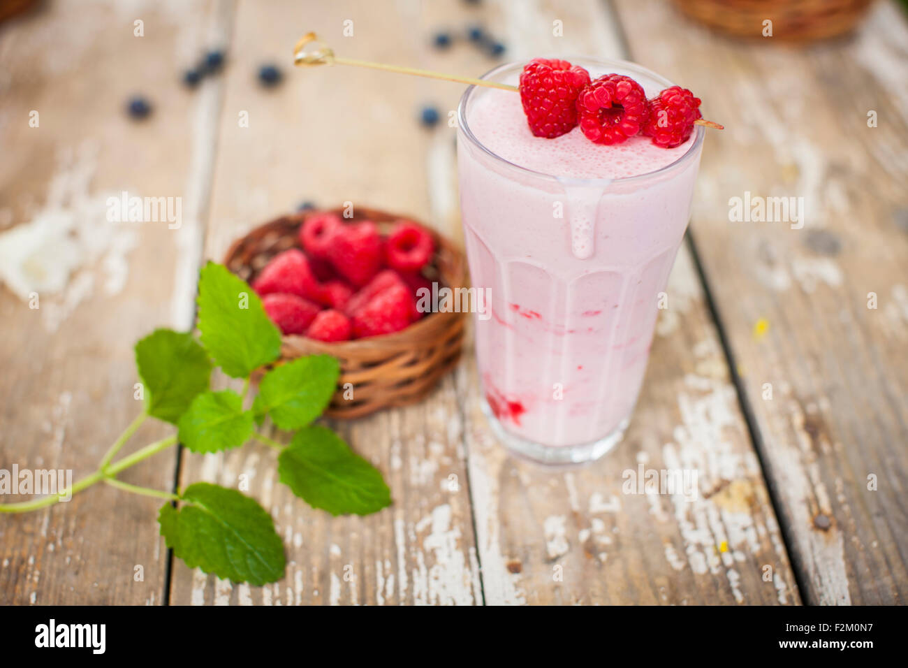 Fresh raspberry milkshake in glass, raspberries Stock Photo - Alamy