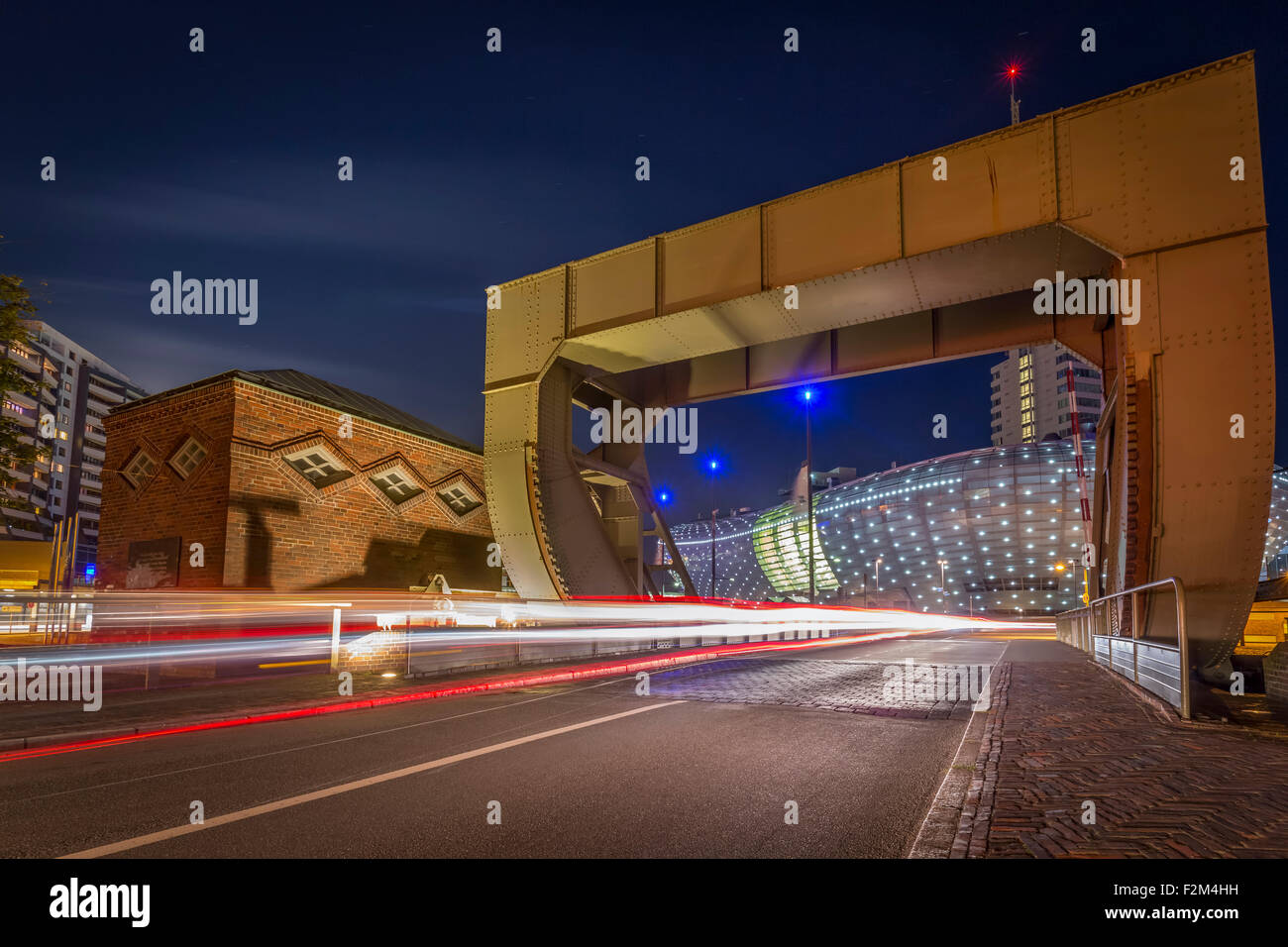 Germany, Bremerhaven, Klimahaus and lift bridge at night Stock Photo ...