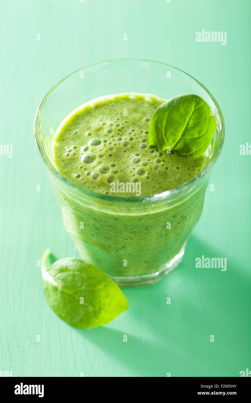 healthy green spinach smoothie in glass Stock Photo - Alamy