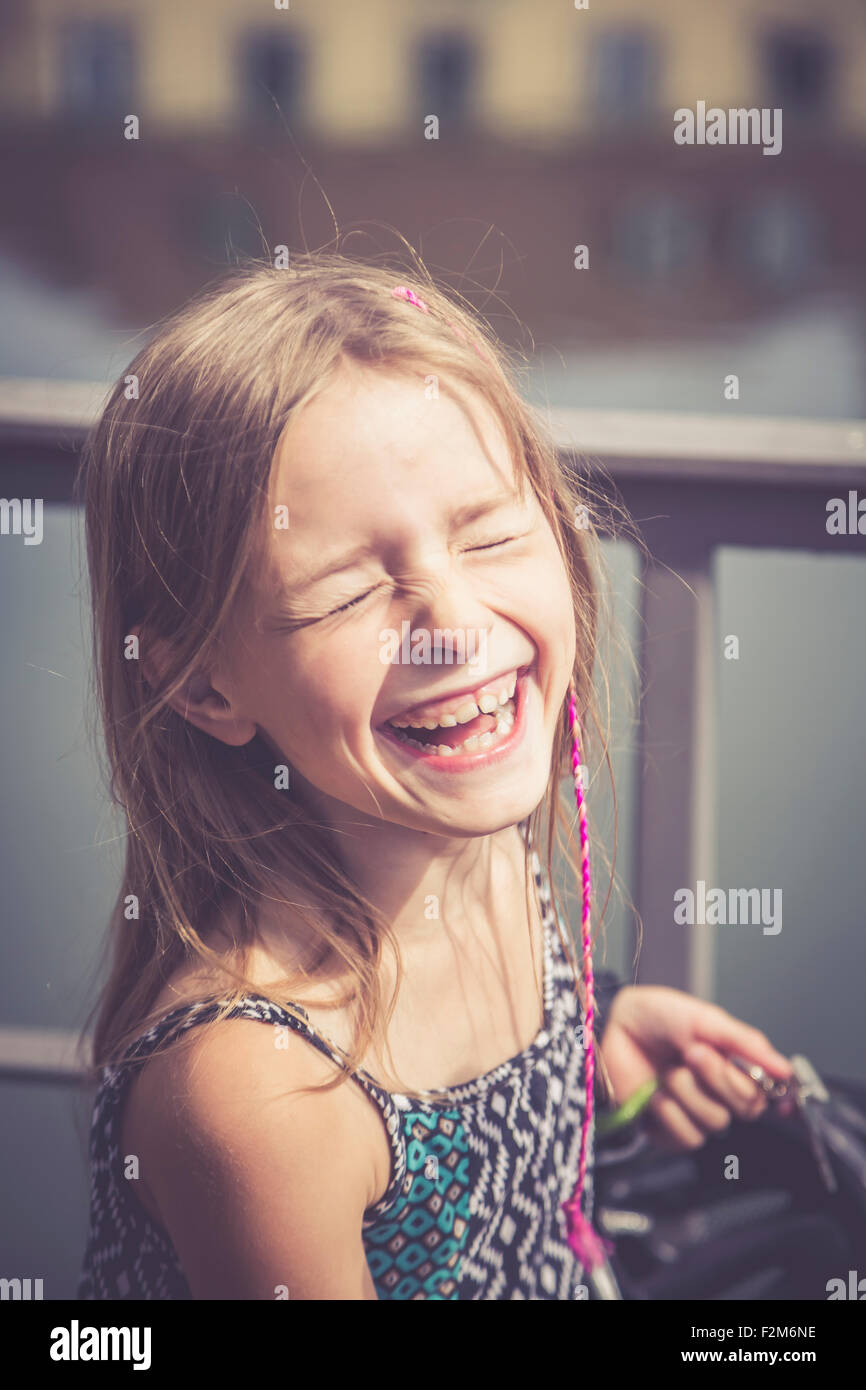 Portrait of laughing girl Stock Photo - Alamy
