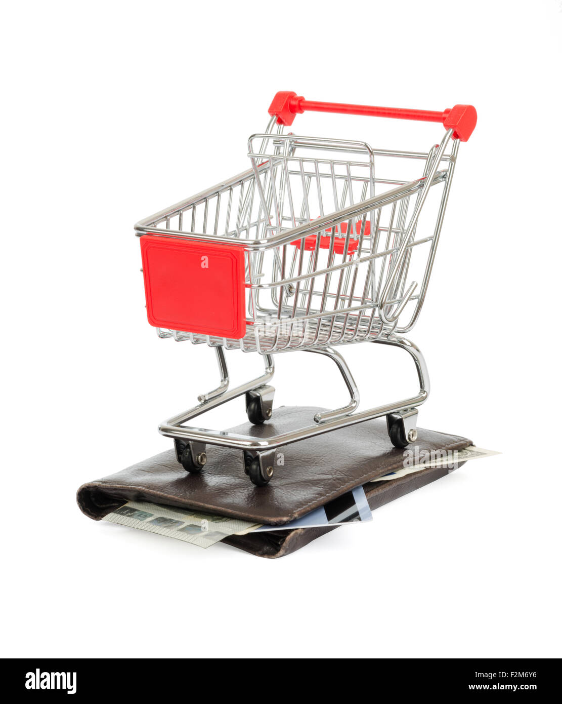 Shopping cart on purse Stock Photo - Alamy