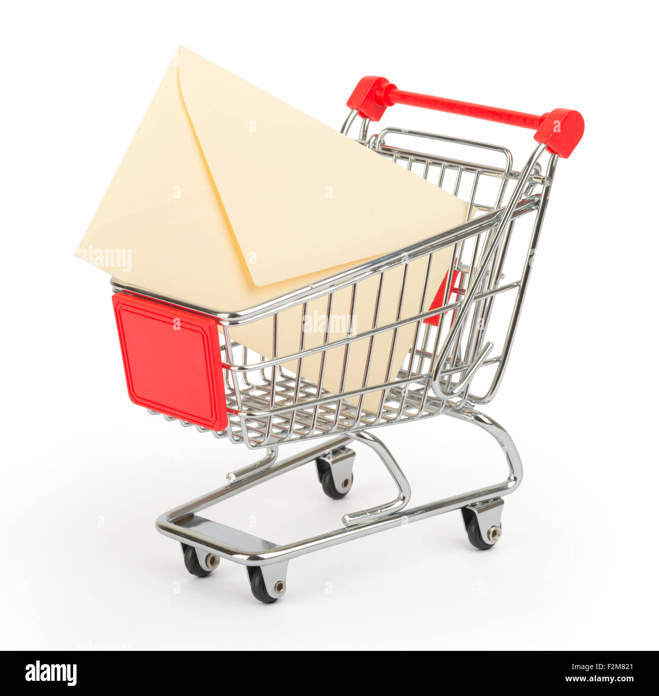 Envelope in shopping cart on white Stock Photo - Alamy