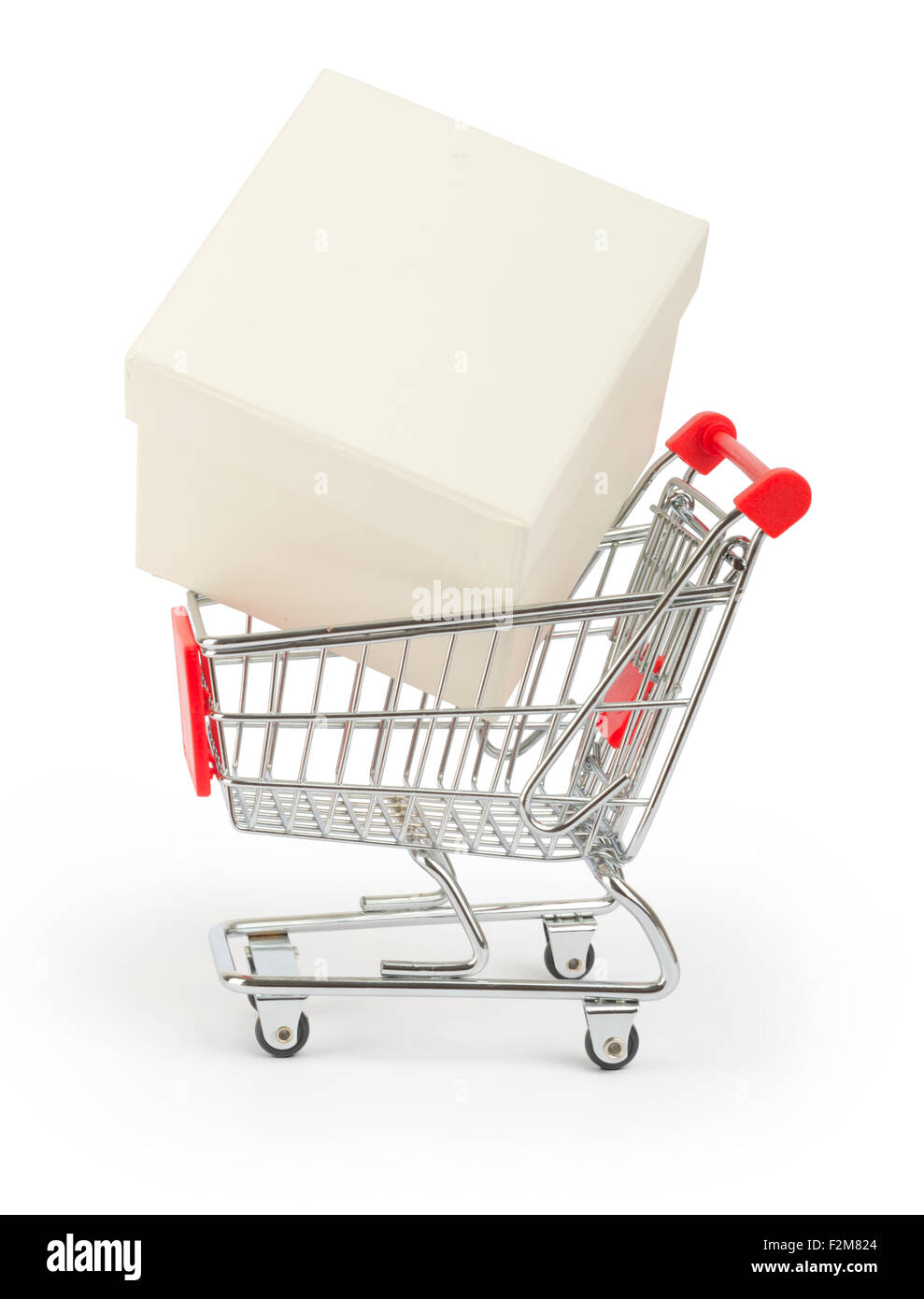 Box in shopping cart on white Stock Photo - Alamy