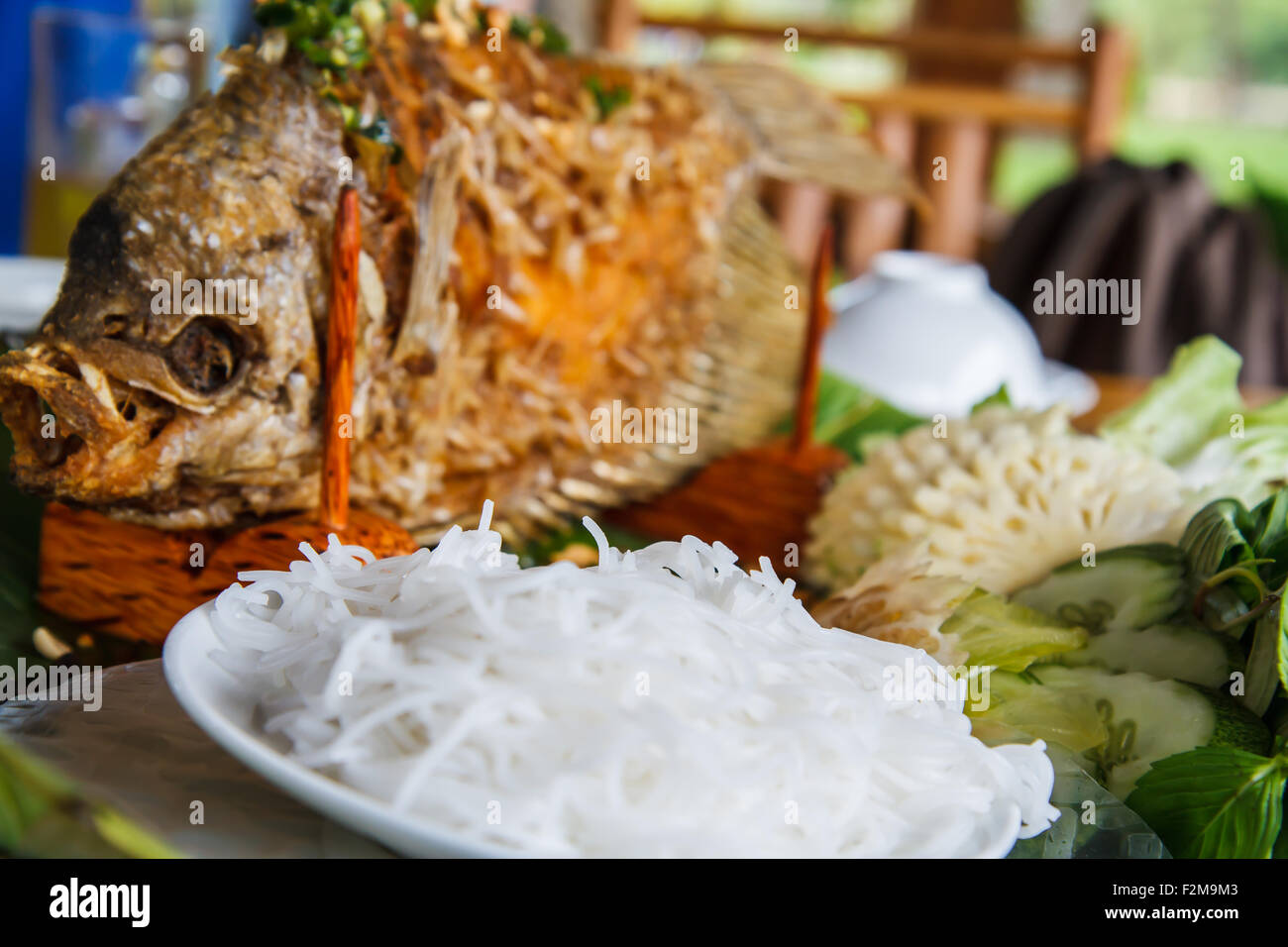 Fried fish prepared in the traditional Vietnamese Stock Photo - Alamy