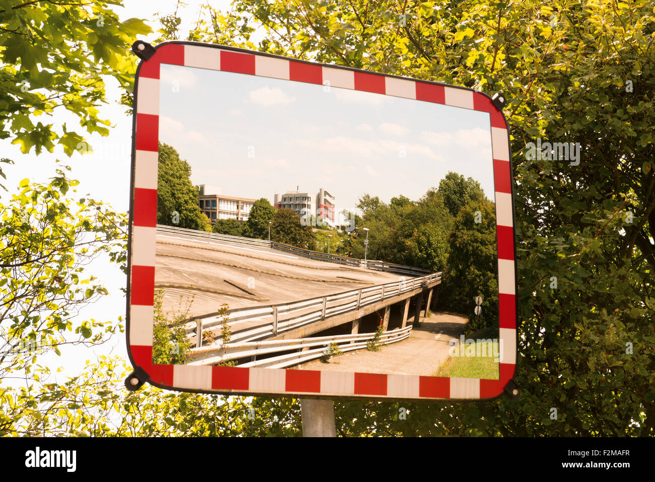 Traffic mirror of a parking level Stock Photo - Alamy