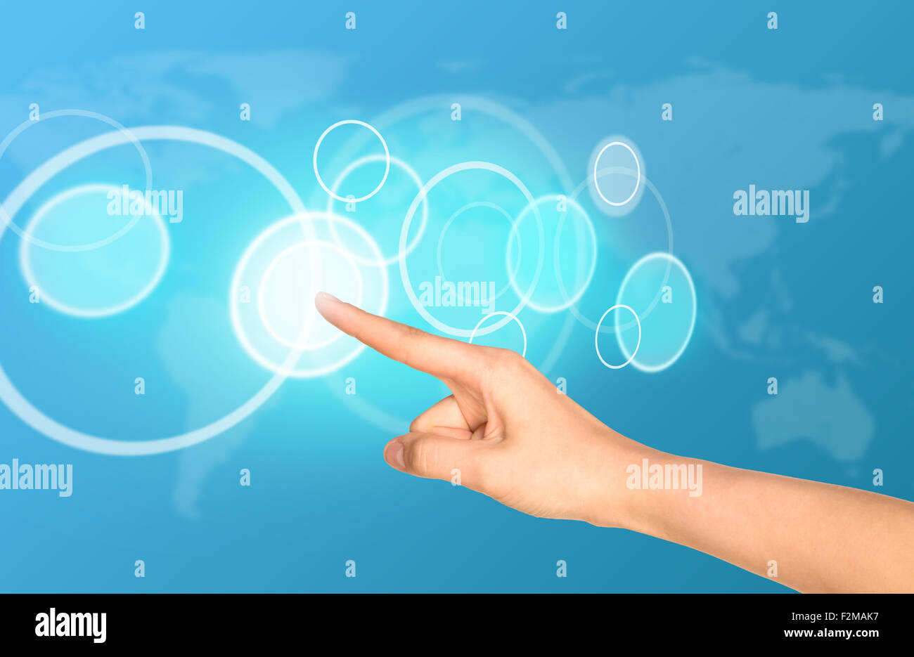 Humans arm touching holographic screen Stock Photo - Alamy